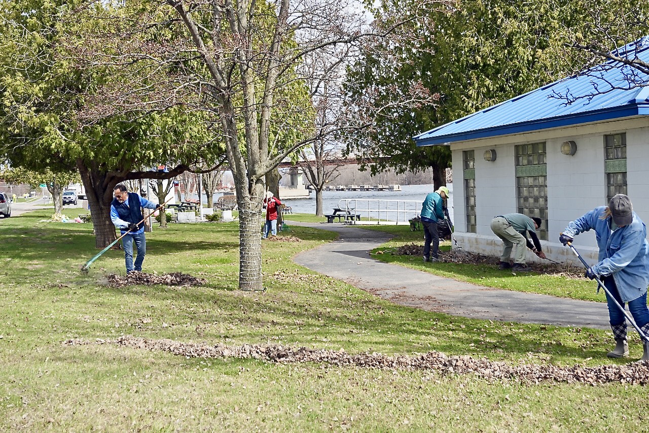 Oswego County Today2025-Canale-Clean-Sweep-raking-Riverside-Park